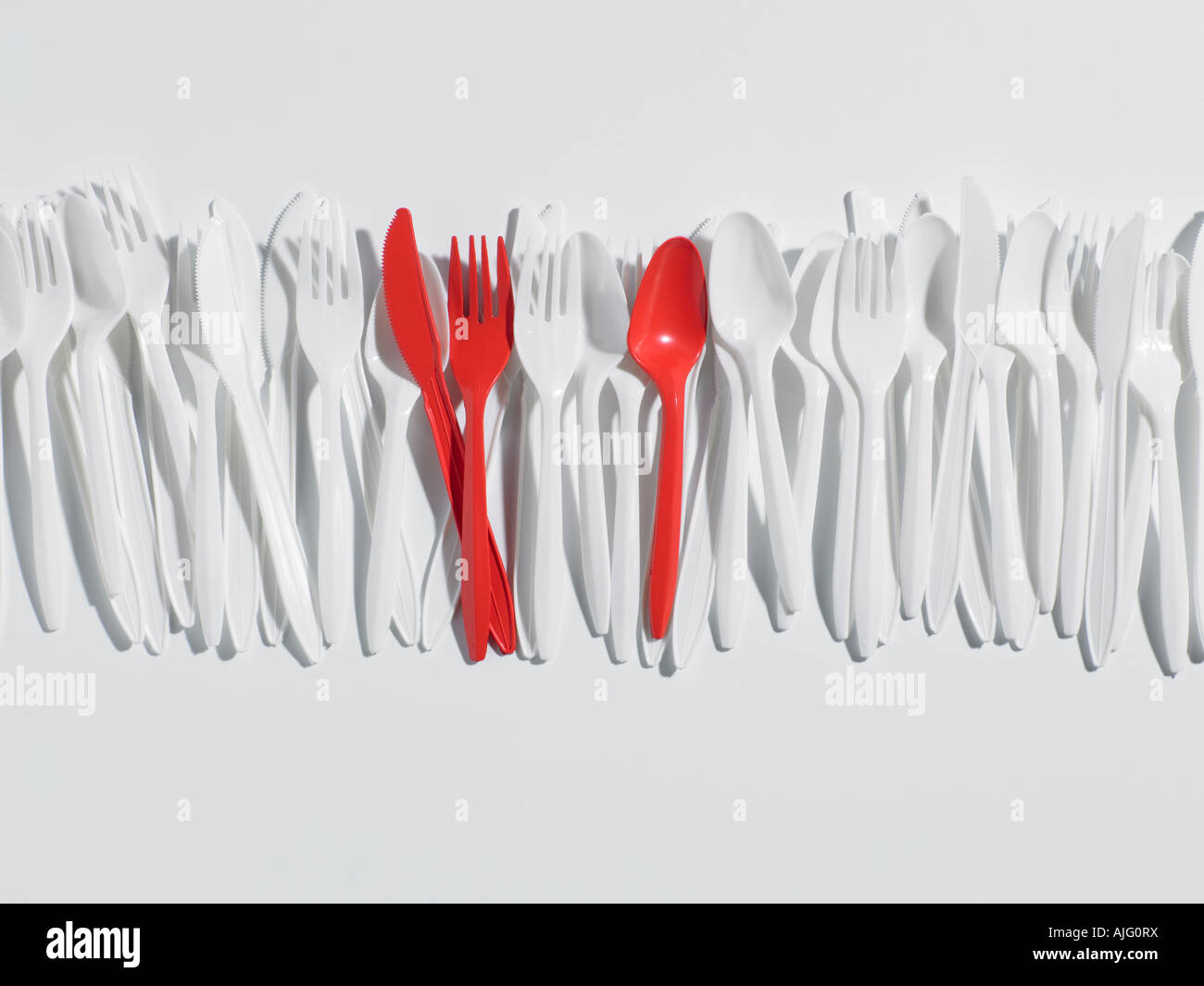 line of plastic cutlery Stock Photo - Alamy