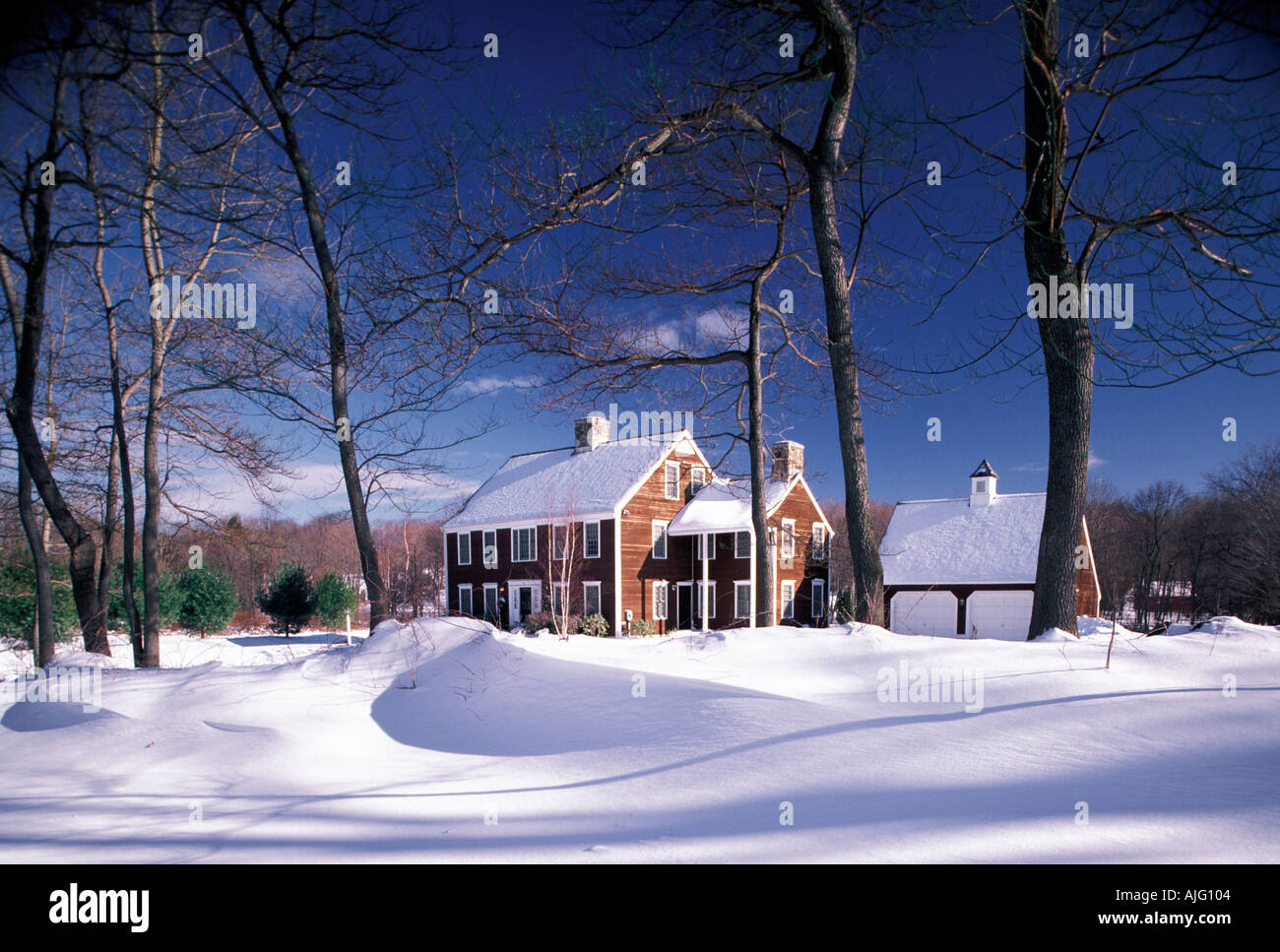 Suburban home covered in snow fall in the middle of winter Stock Photo ...