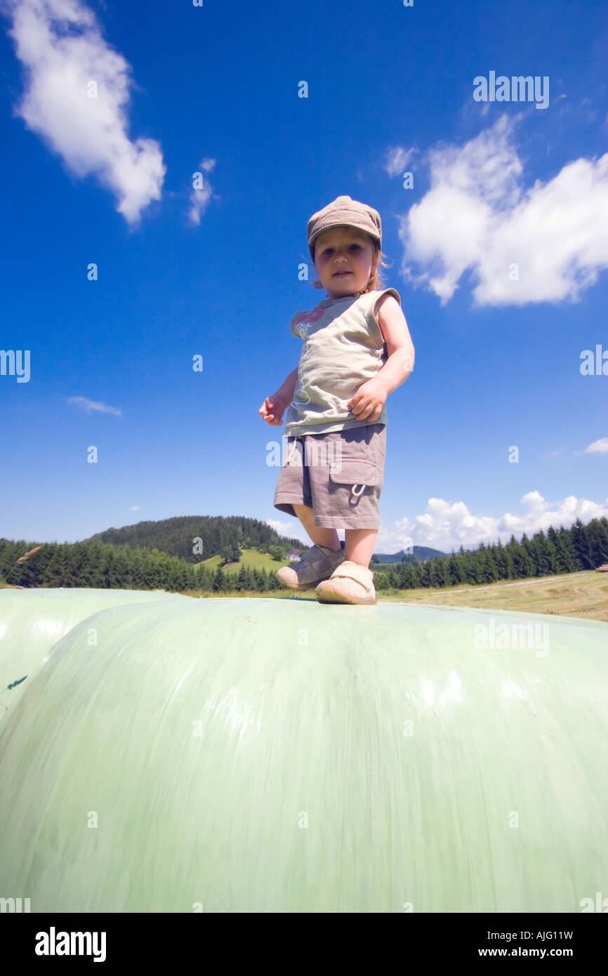Young Boy on Farm Silo Stock Photo - Alamy