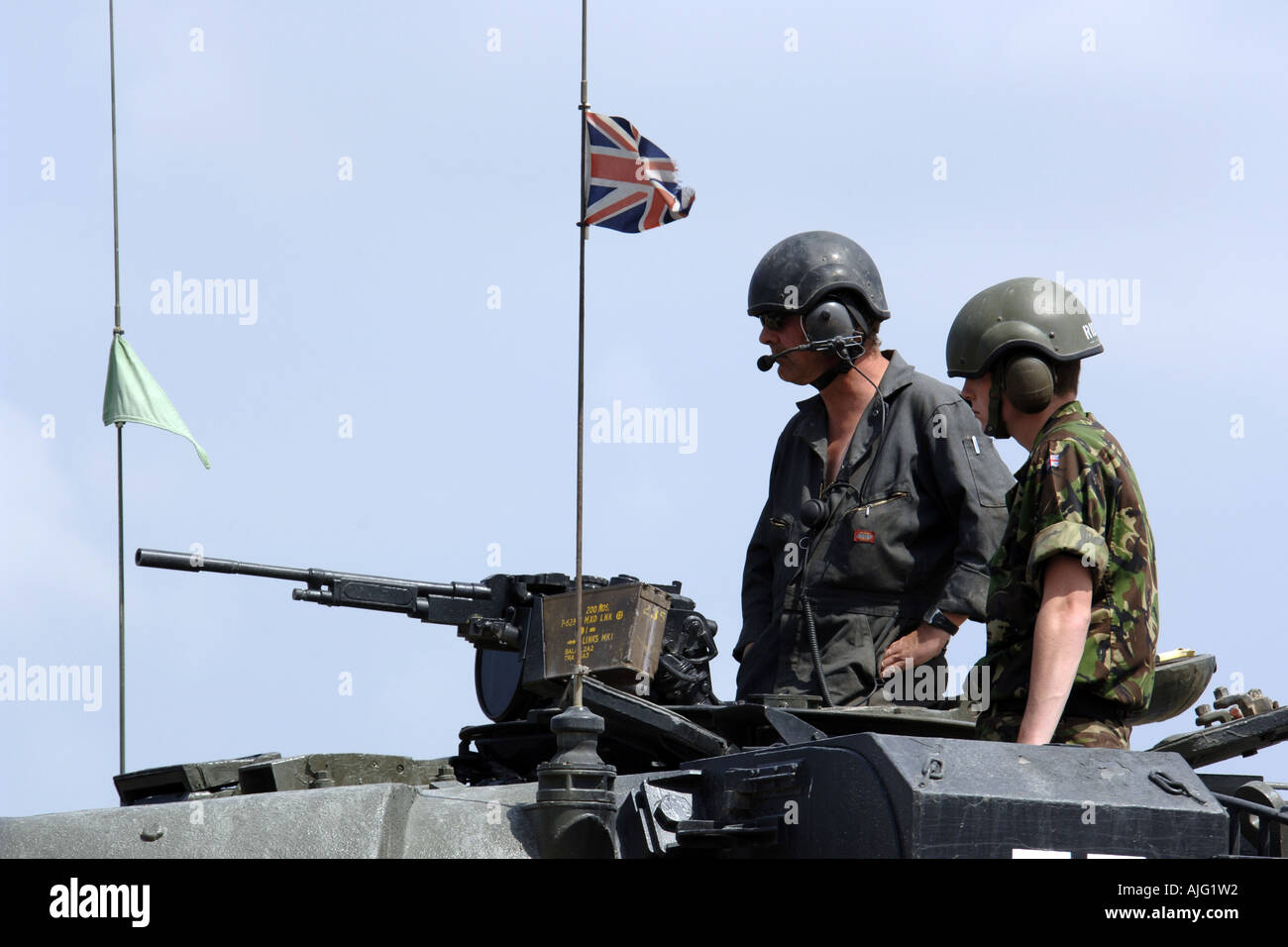British Army Tank Crewmen standing inside a tank turret Stock Photo - Alamy