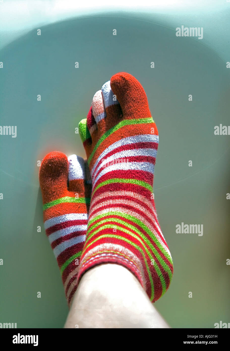 Crossed toes hi-res stock photography and images - Alamy
