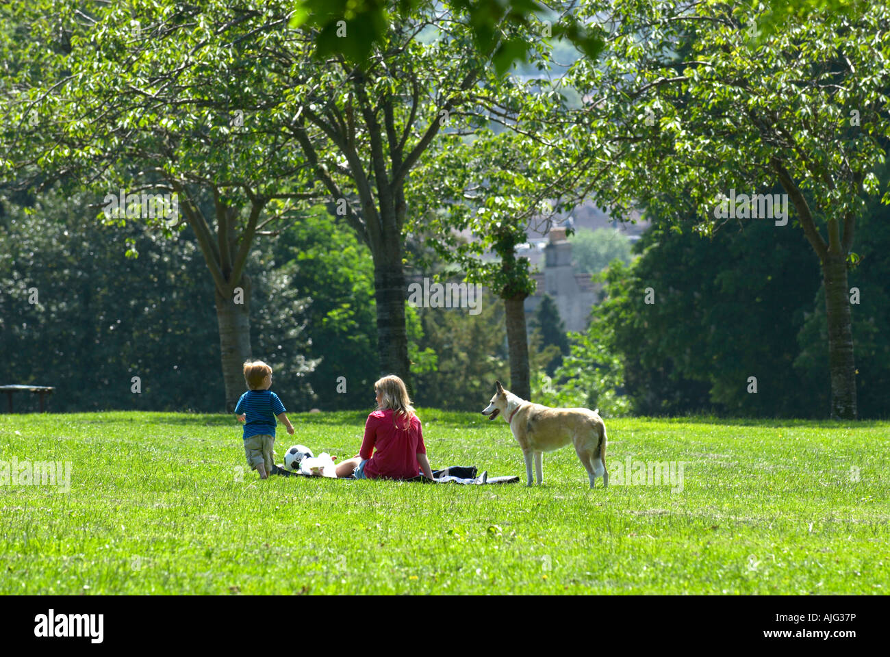 Whilst watching play hi-res stock photography and images - Alamy