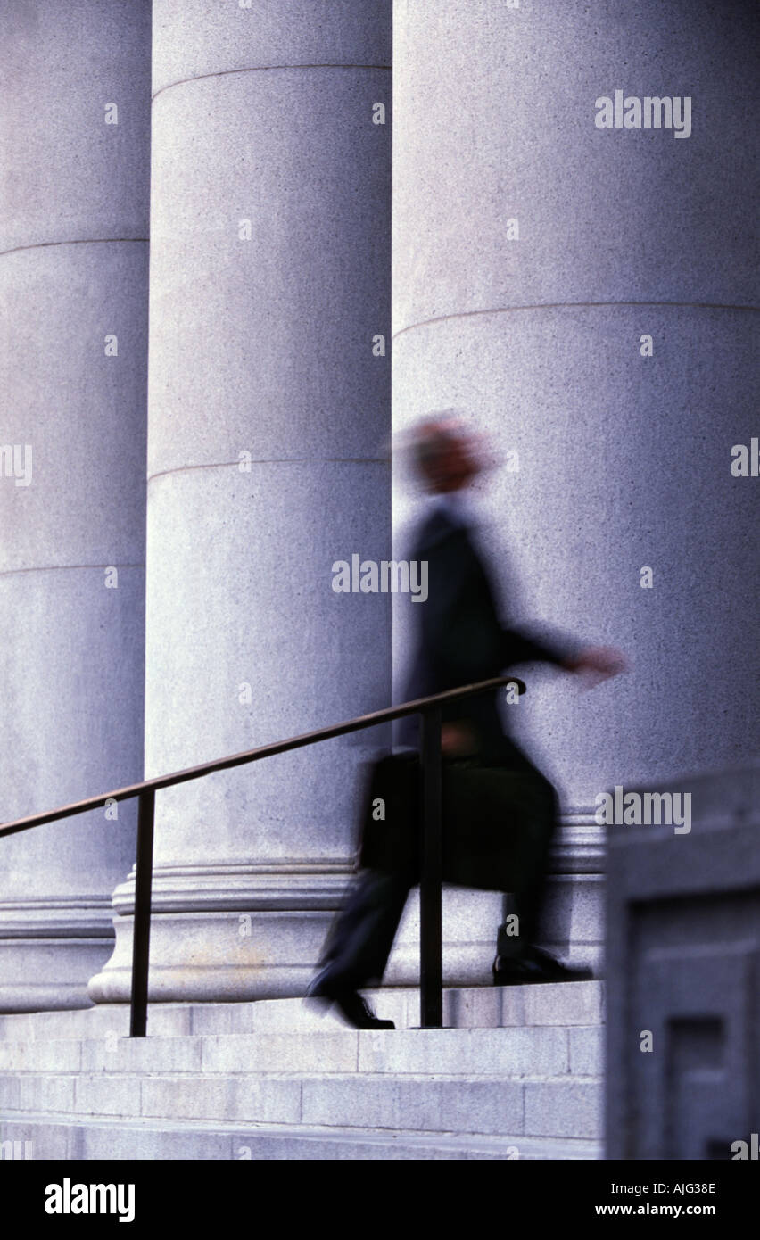 Hurrying into office building hi-res stock photography and images - Alamy