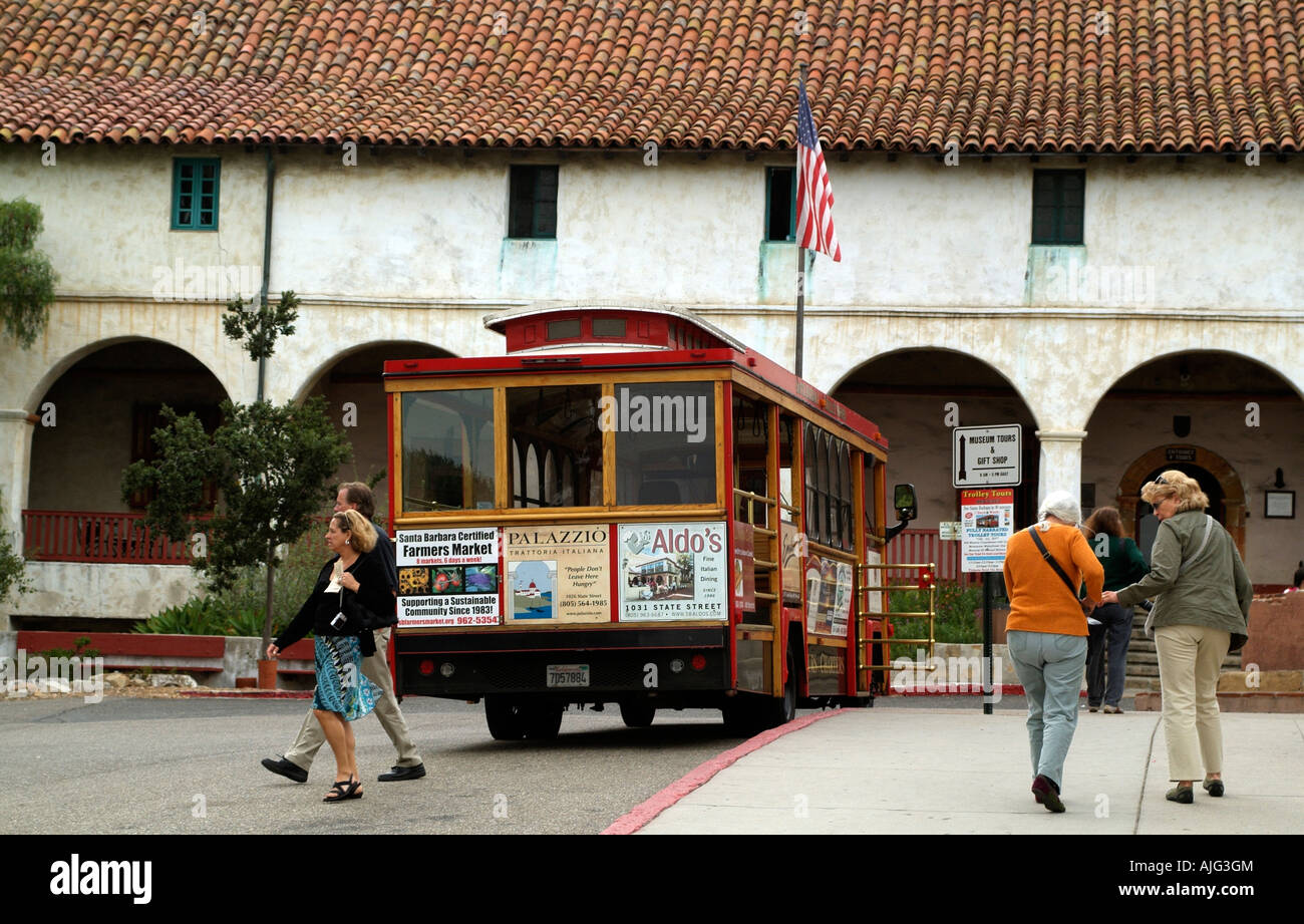 Trolley Tour Tourist Bus with passengers alight at the Old Mission in ...