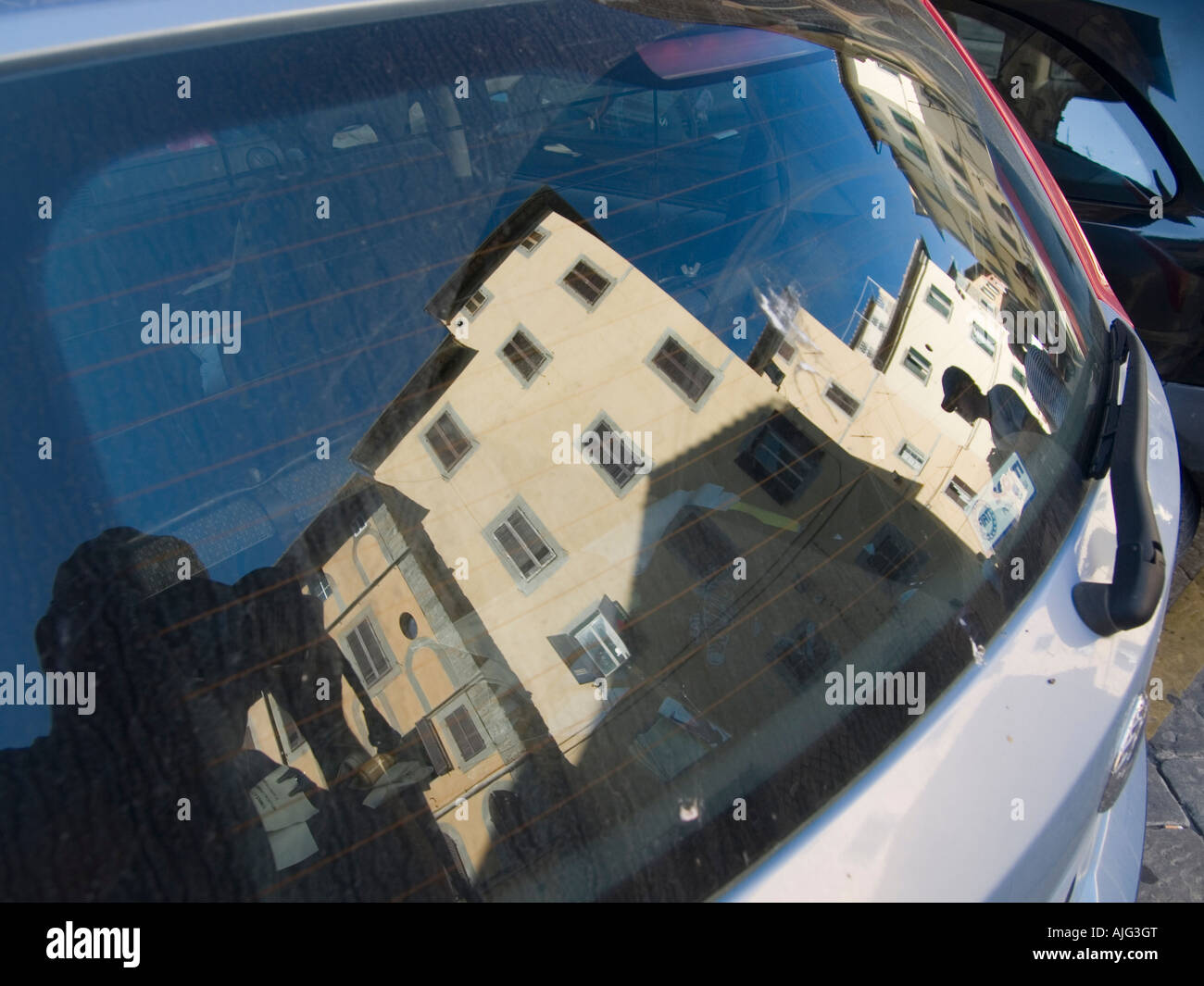 Buildings reflected a car window Stock Photo - Alamy