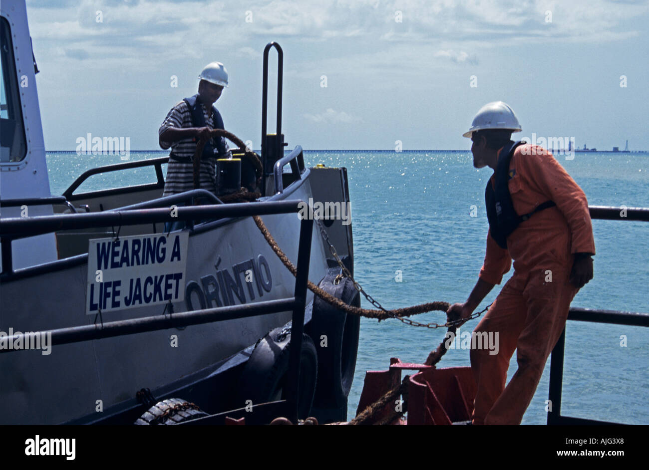 Vessel dredger dredging boats work boat crew men workers hi-res stock ...