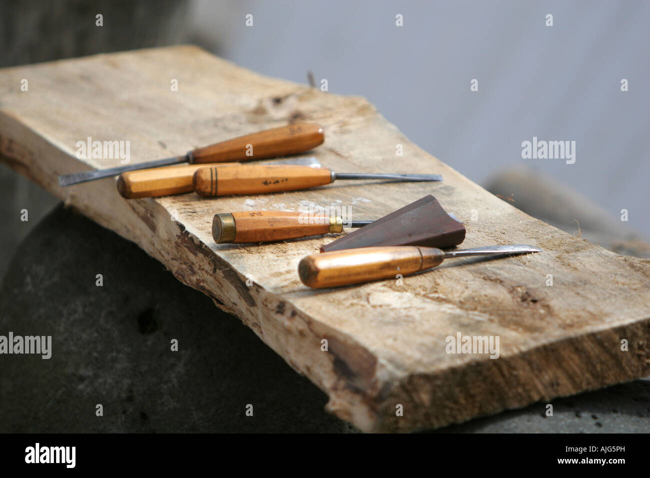 woodworkers tools lying on a piece of woodboard Stock Photo - Alamy