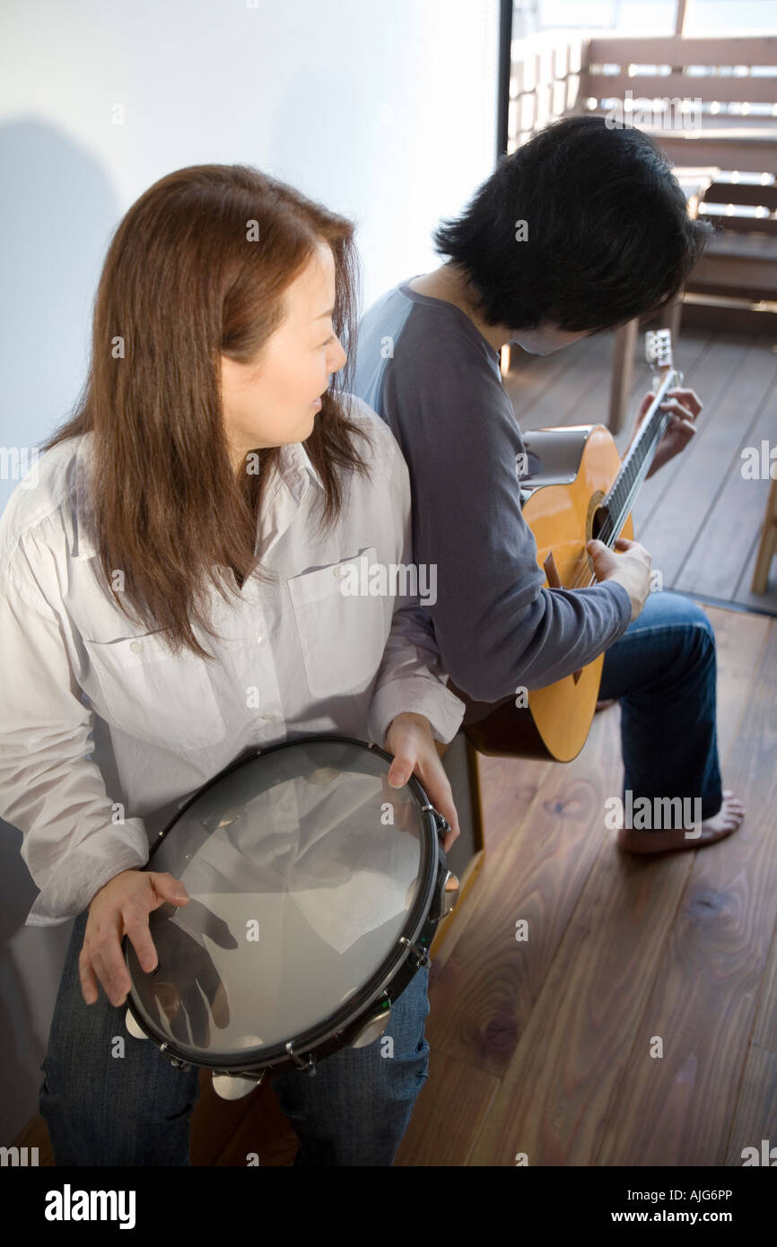 Young people playing musical instruments Stock Photo - Alamy