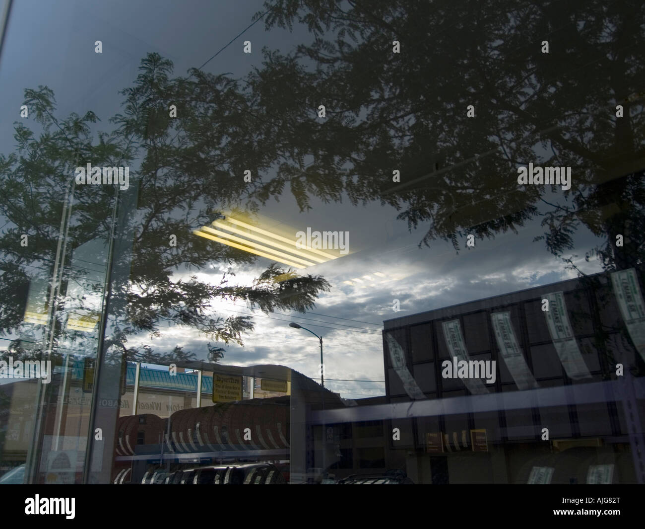 Reflections in storefront windows Stock Photo - Alamy