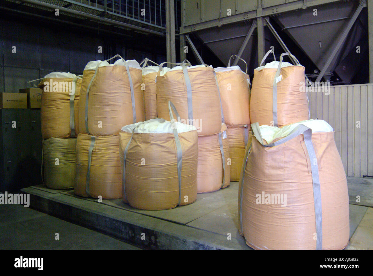 Sake production process rice in bales at the Gekkeikan Company in ...