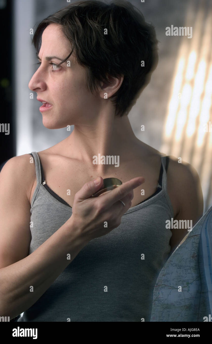 Portrait Caucasian woman looking out window intensely Stock Photo - Alamy