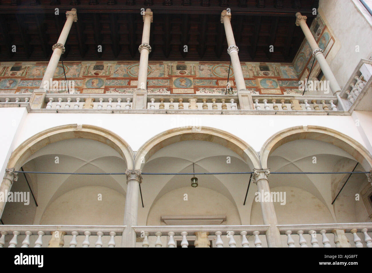 Detail of arches and pillars decorating the balcony at Krakow Castle ...