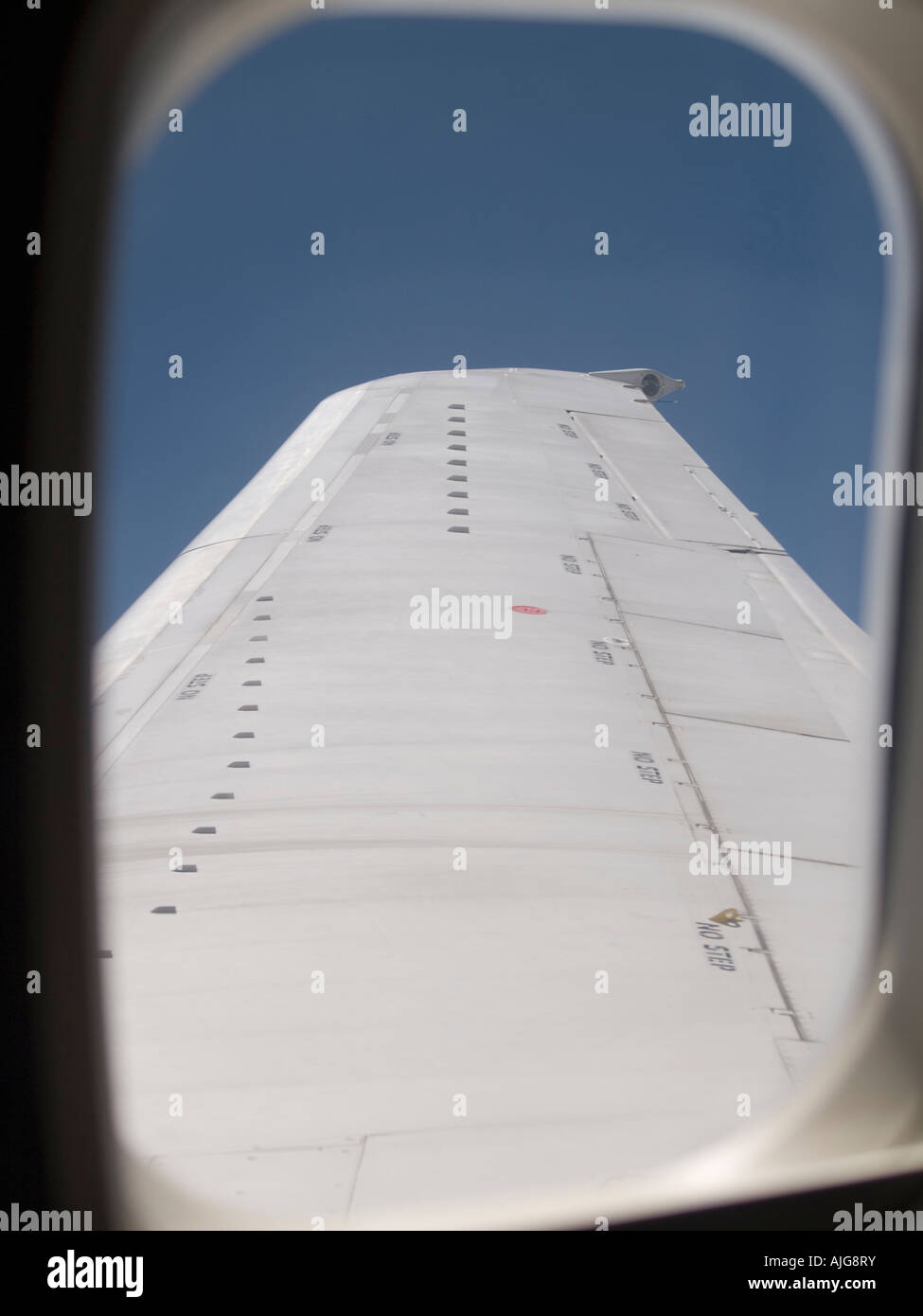 Looking out the window of an airplane Stock Photo - Alamy