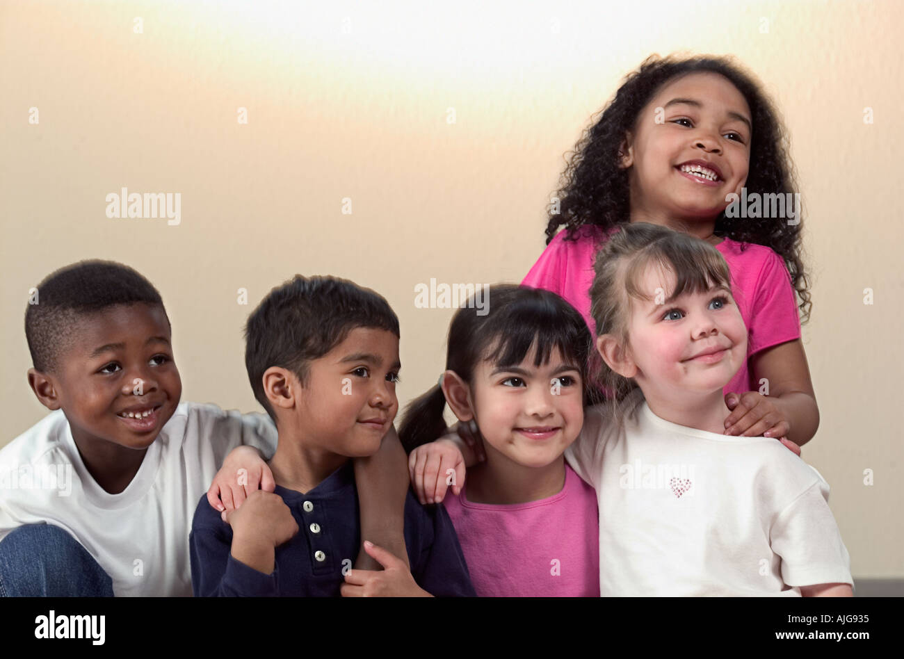 Studio portrait of a group of happy and healthy mixed racial preschool ...