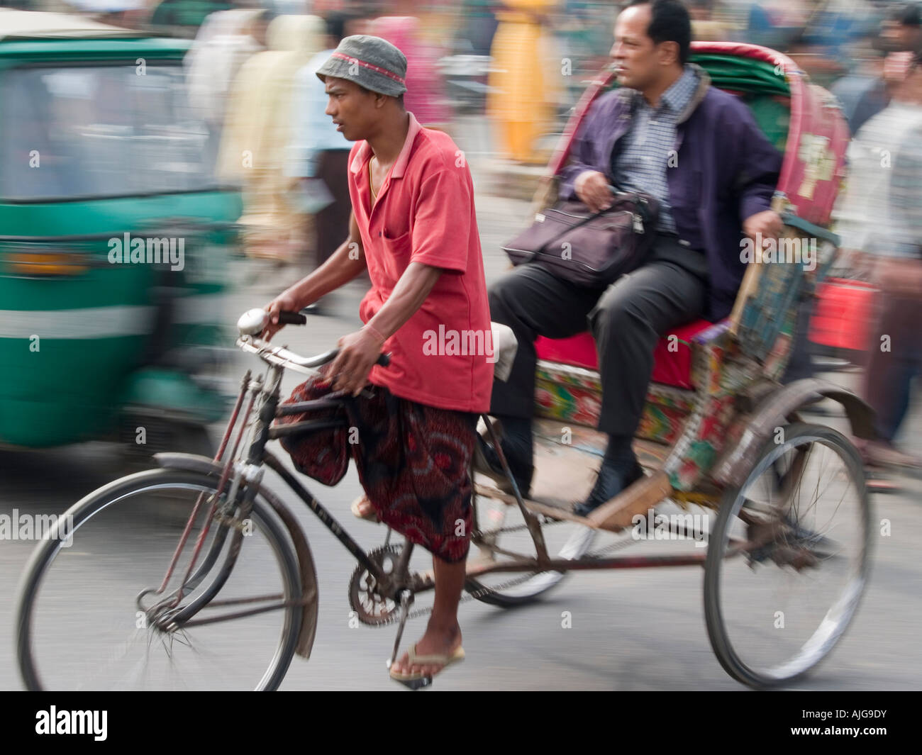 Bicycle rickshaw drivers at work Stock Photo - Alamy