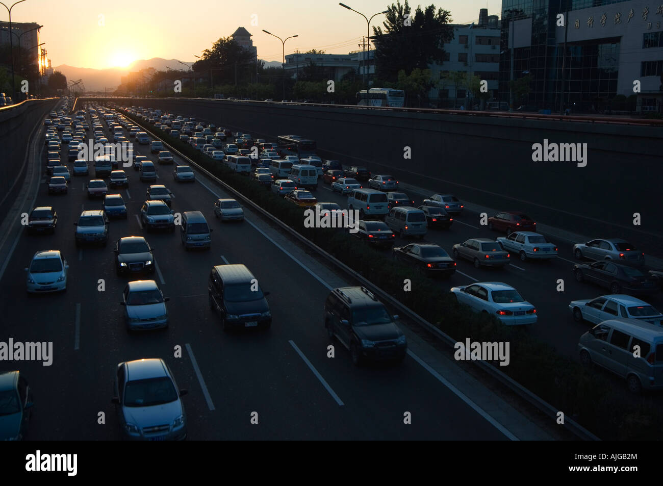 sunset over city ring road during rush hour Beijing China Stock Photo ...