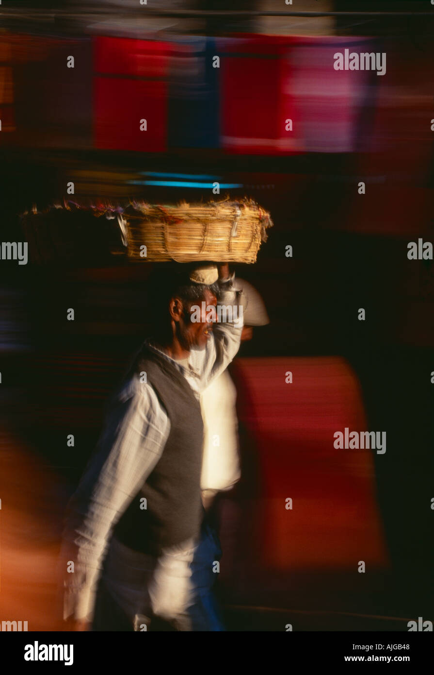 Man carrying basket on his head hi-res stock photography and images - Alamy