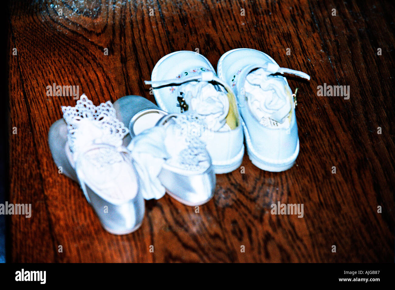 two pairs of cute children shoes Stock Photo - Alamy