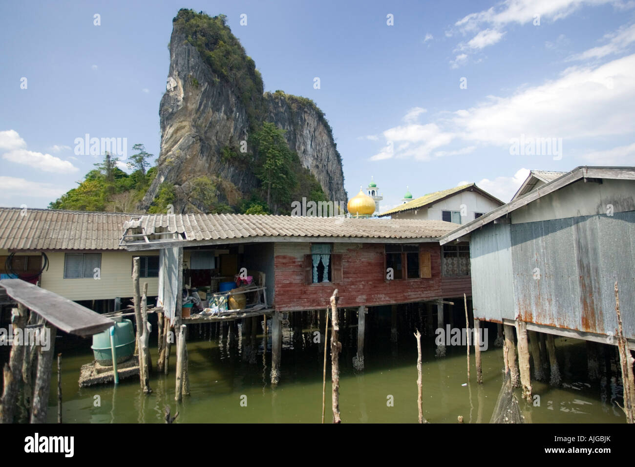 A gold dome tops the mosque Ko Panyi Muslim fishing village on stilts ...