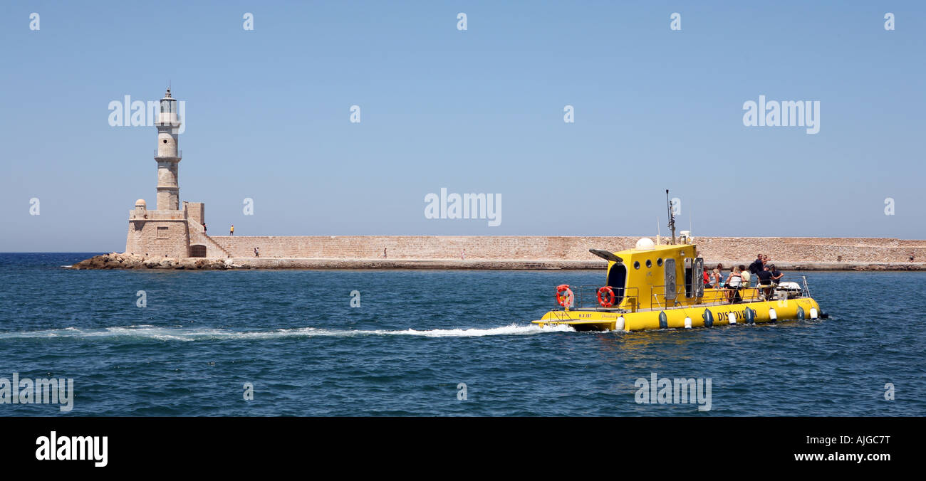 A tourist underwater sightseeing boat returning to Hania Harbour Crete ...