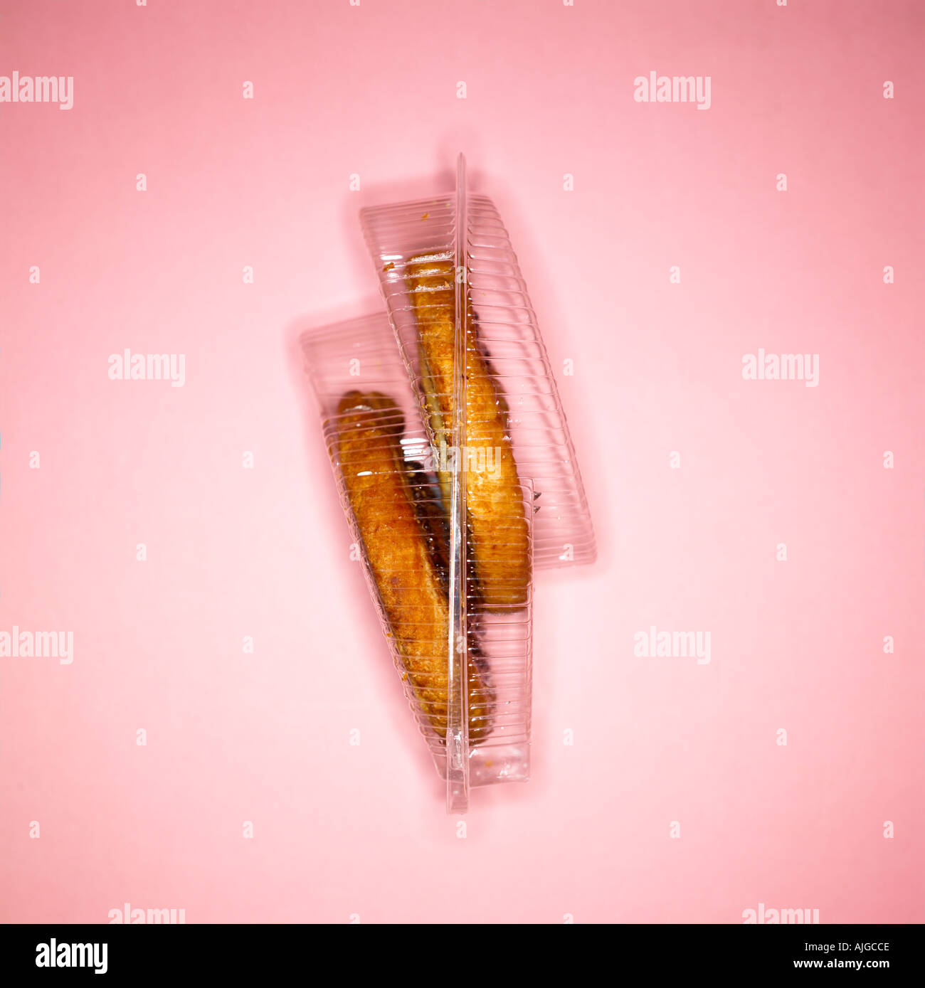 Danish pastries in a plastic container showing excessive packaging ...