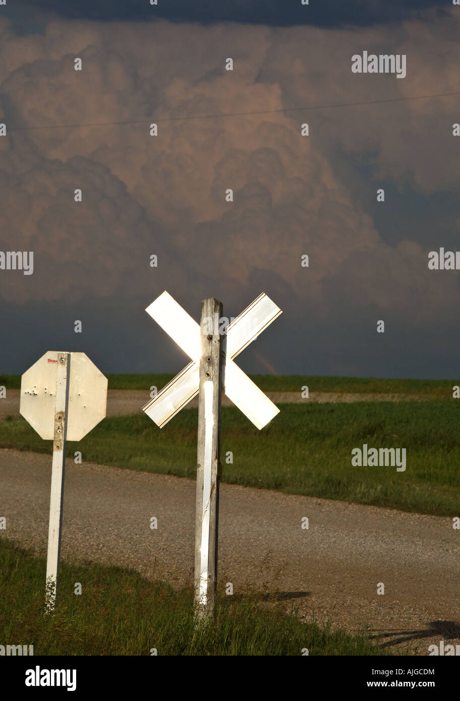 Storm clouds seen behind road signs Stock Photo - Alamy