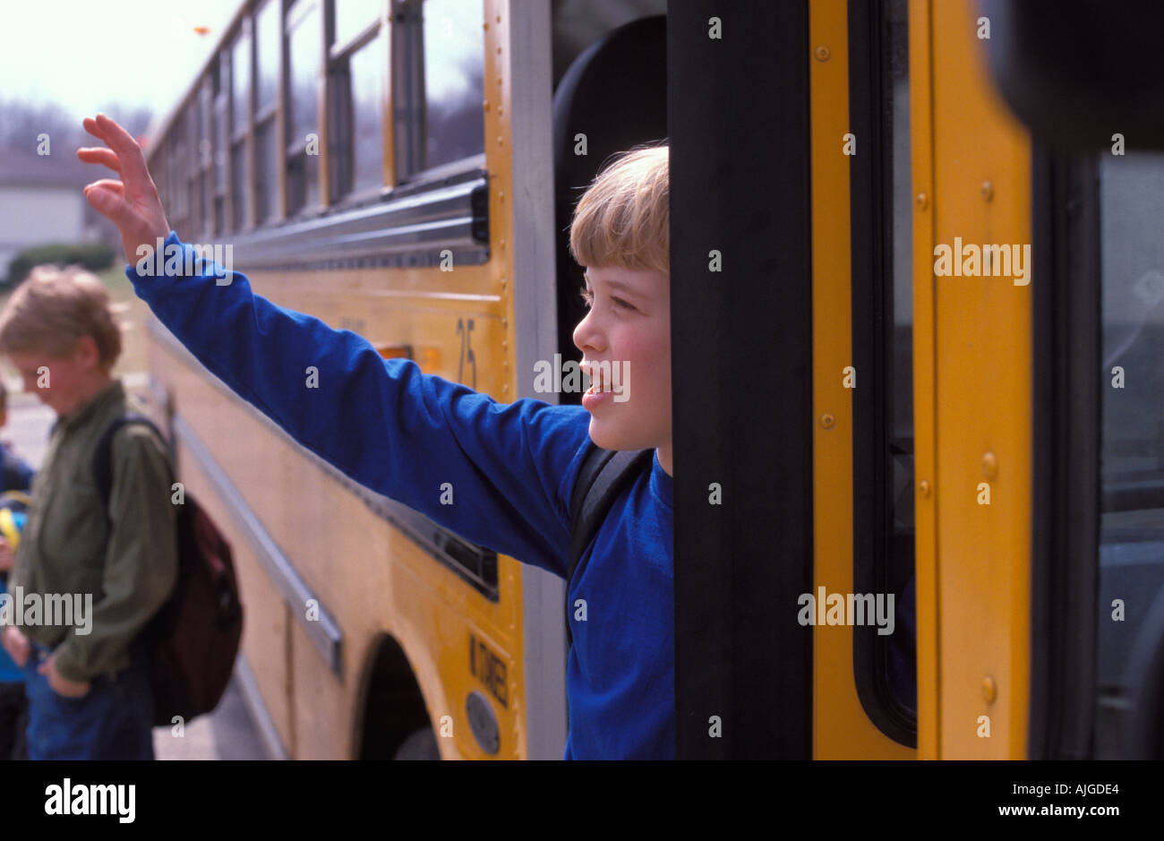 Kid exiting school bus hi-res stock photography and images - Alamy