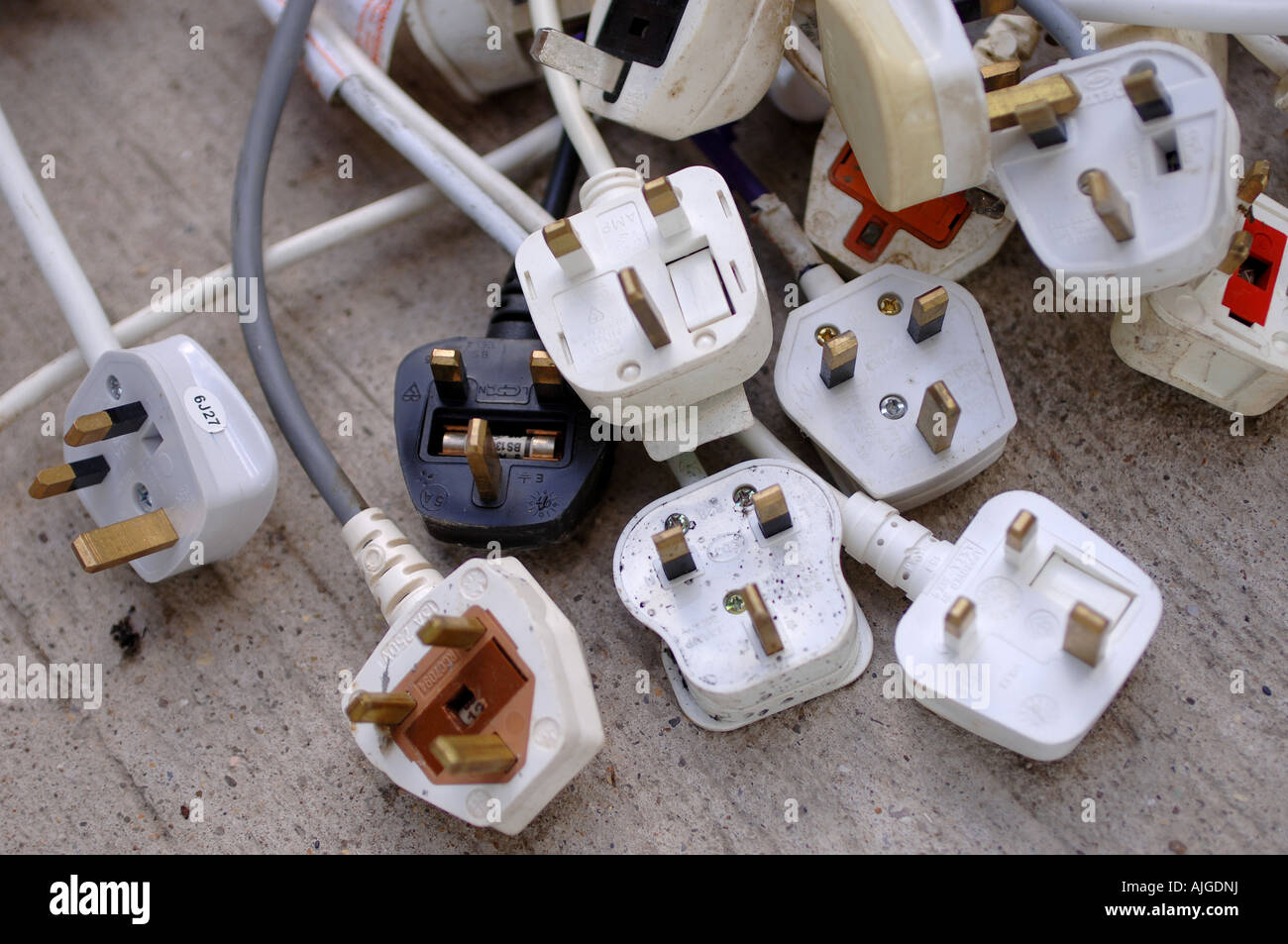 A pile of electrical plugs at a recycling centre in Bideford, North ...