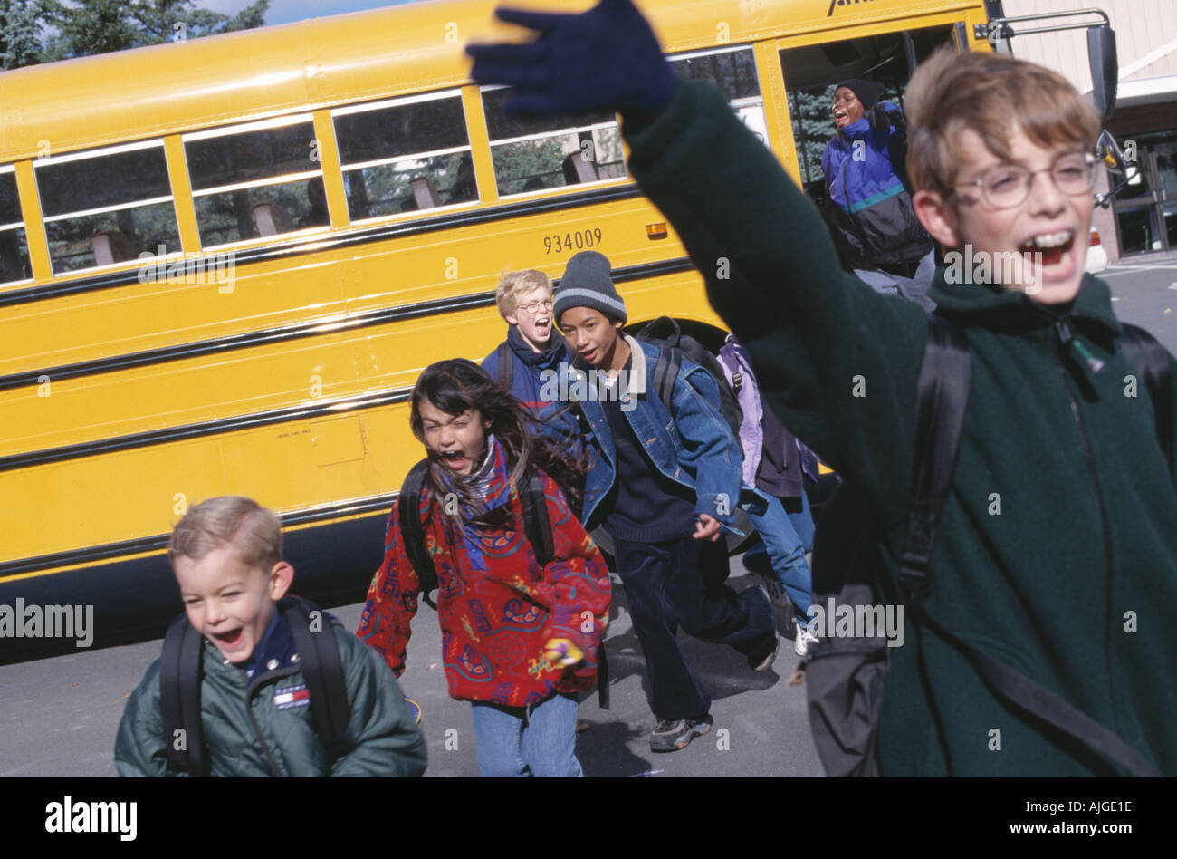Excited, yelling, exuberant integrated elementary school students ...