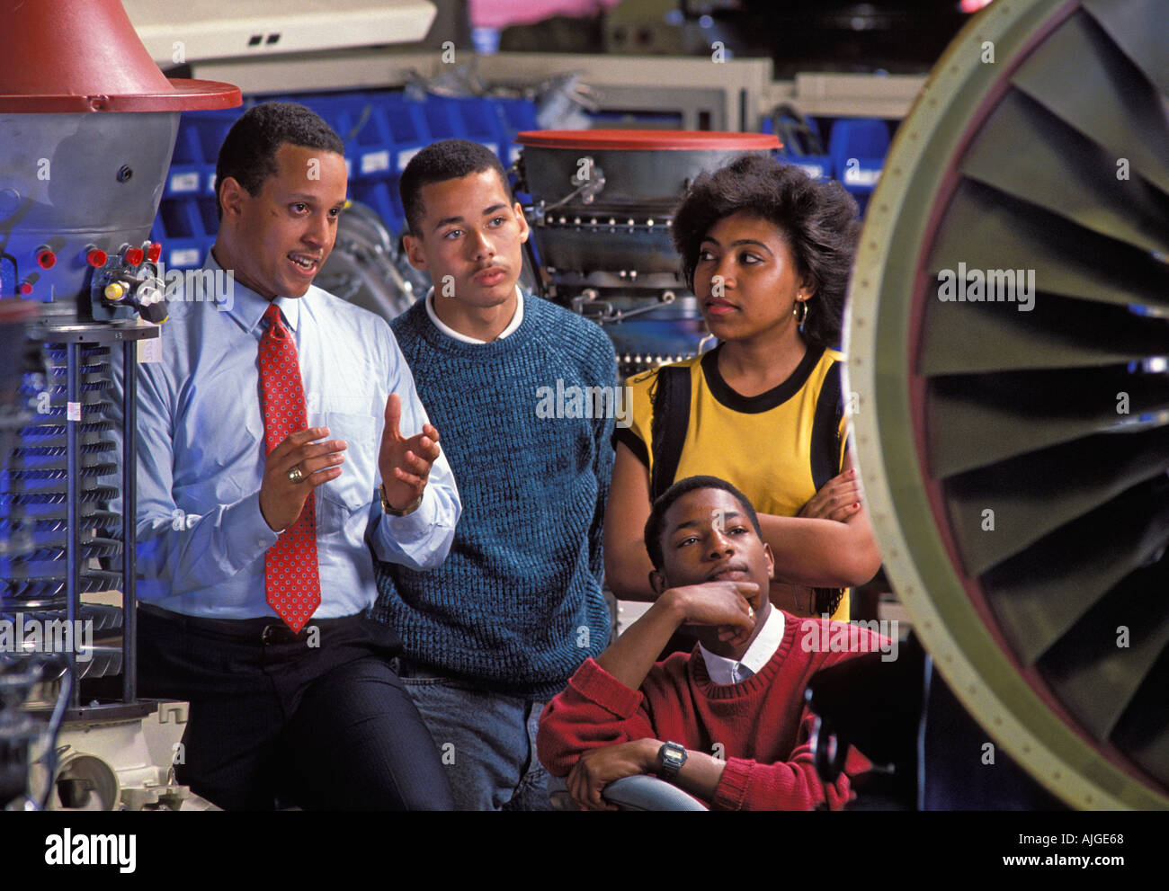 A group of African American engineering students touring aircraft ...