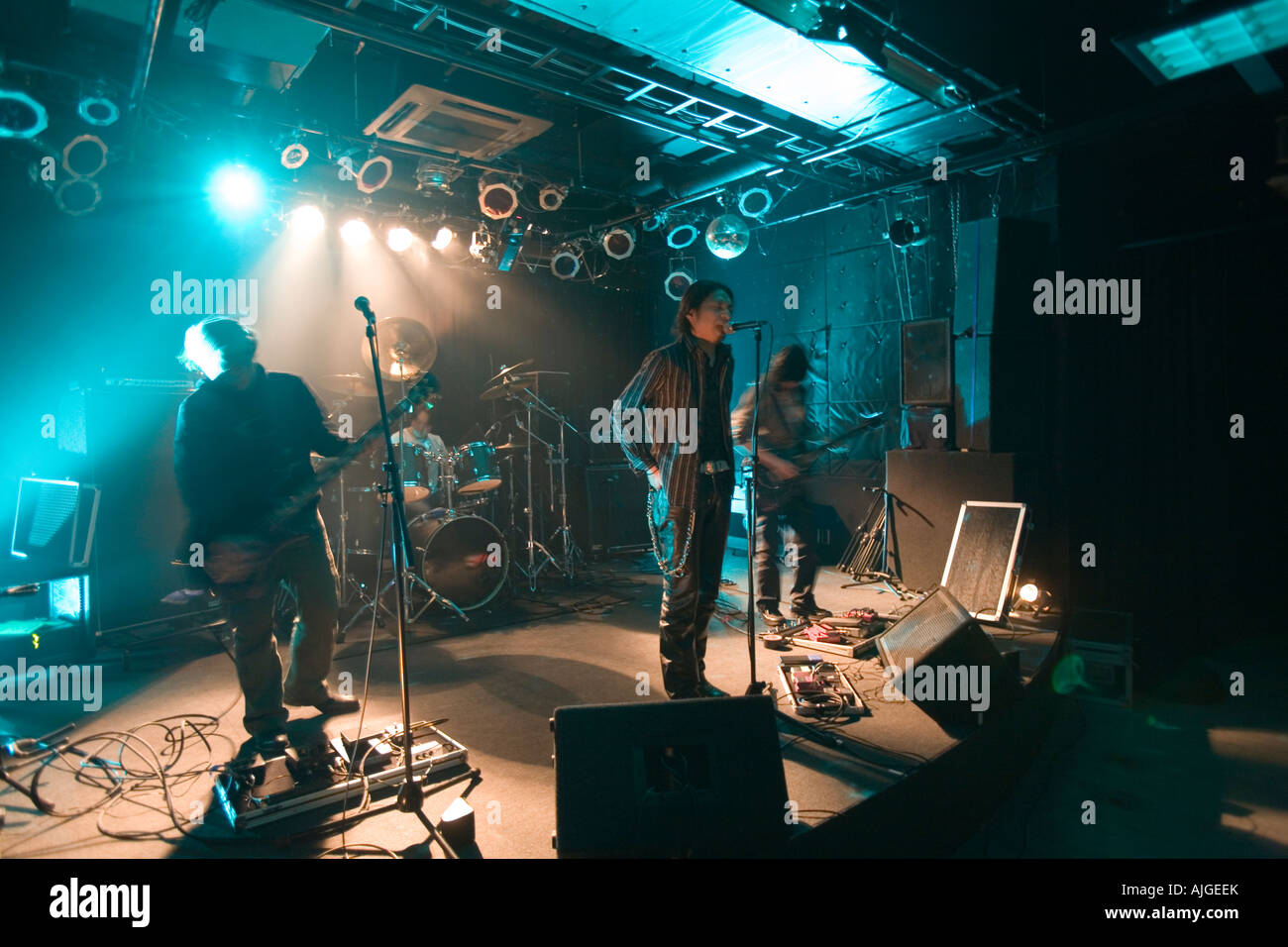 Rock band in concert Stock Photo - Alamy