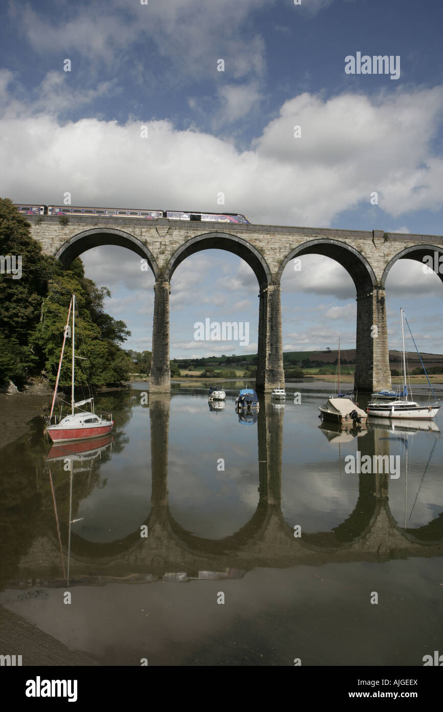 The rail viaduct over the boats on the estuary of the River Lynher at ...