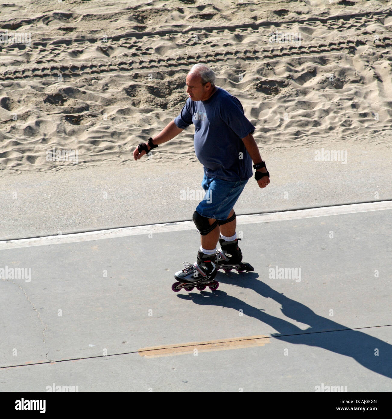 Man rollerblading by beach hi-res stock photography and images - Alamy