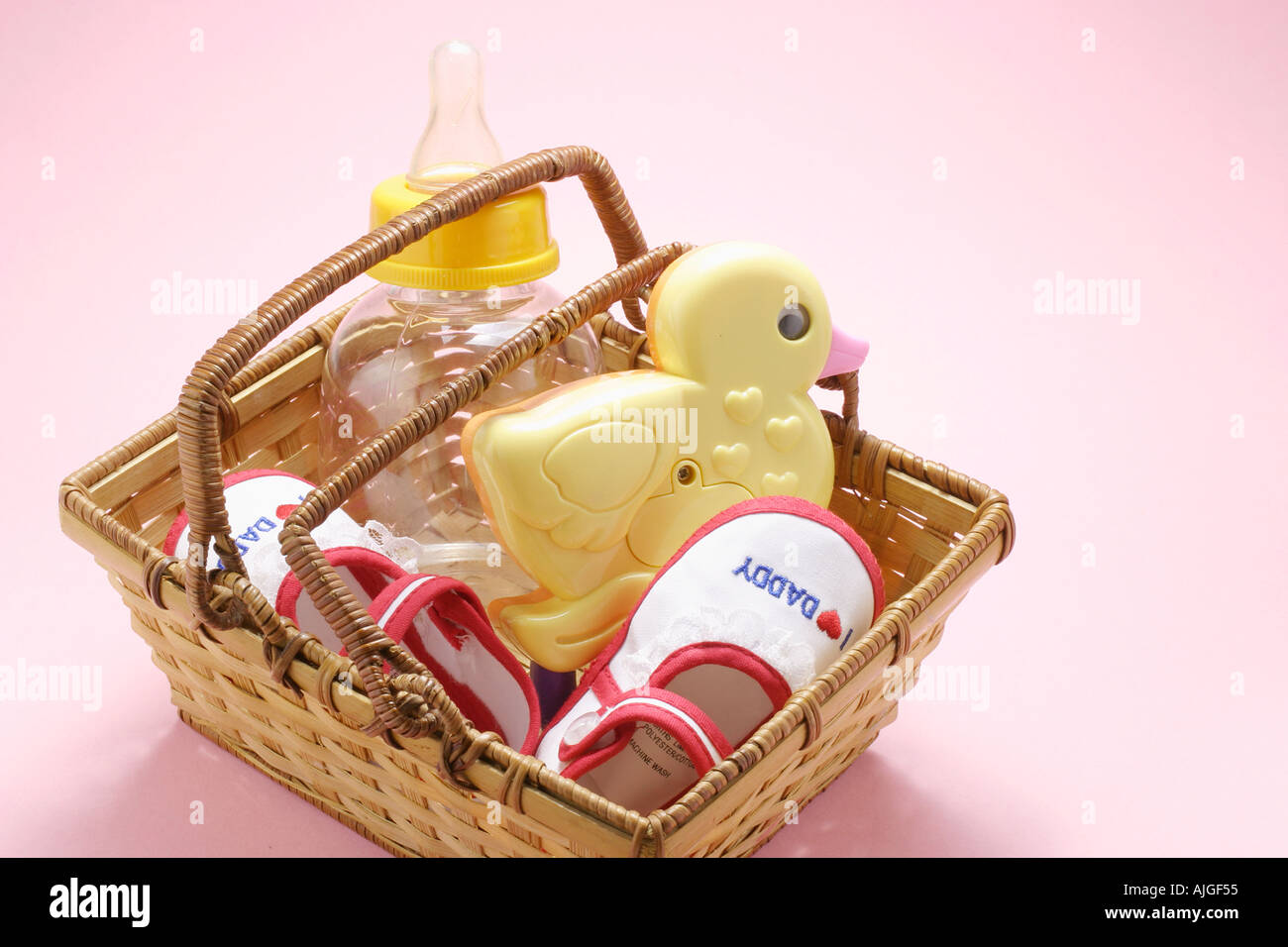 Baby's Items in Basket Stock Photo - Alamy