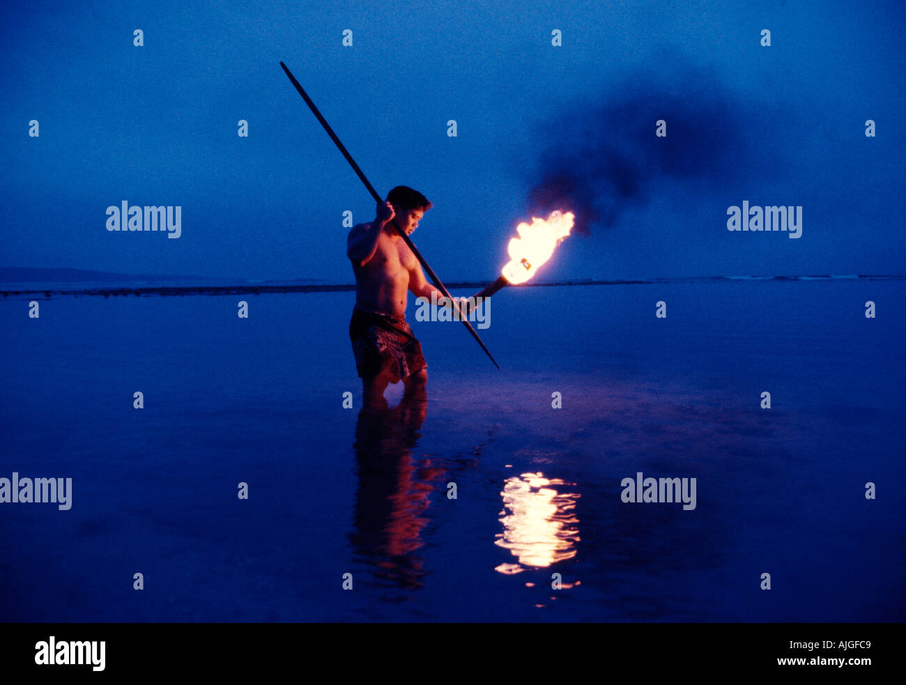 Torch fishing at Kihei Maui Stock Photo - Alamy