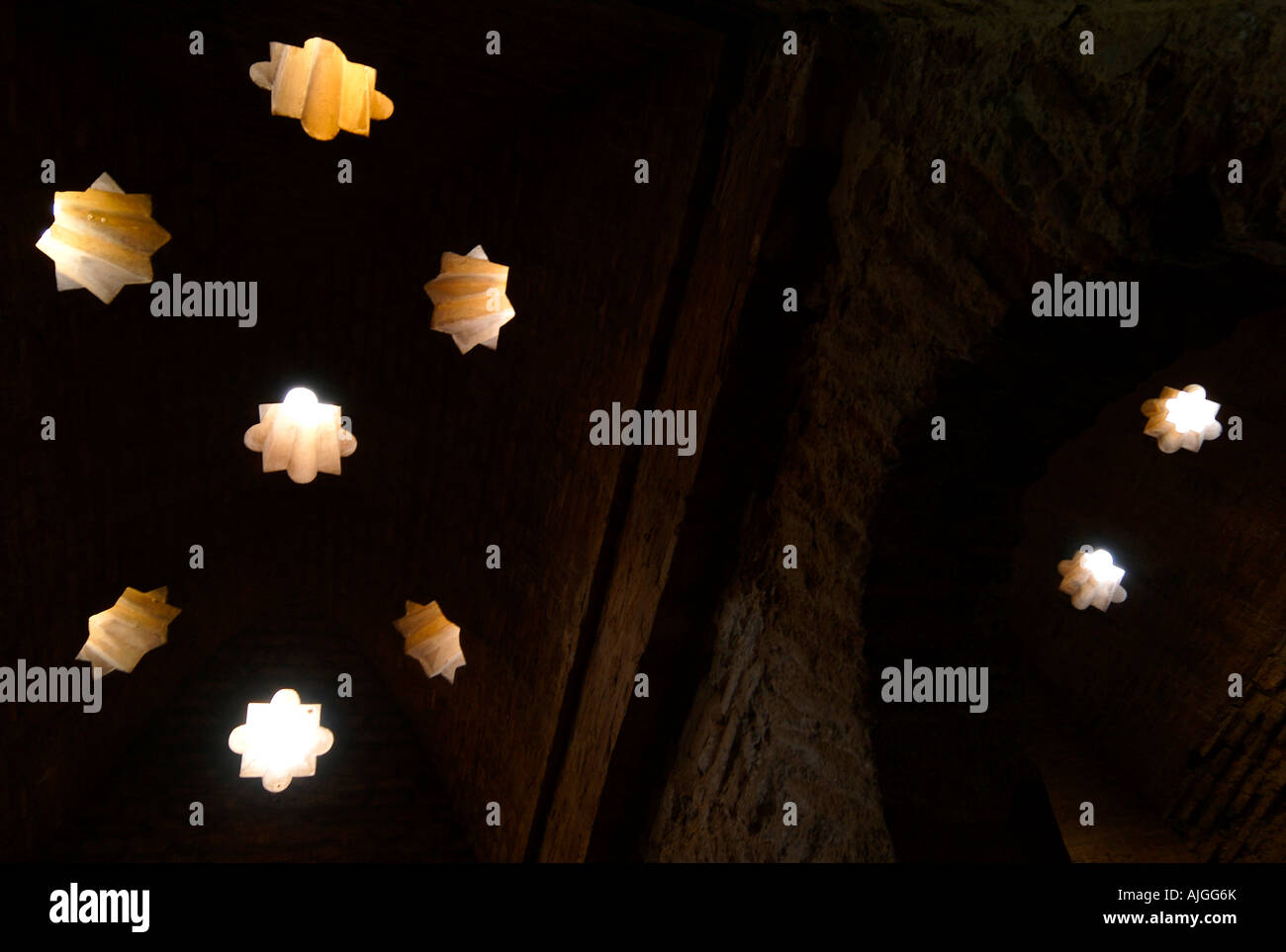 Star shaped skylights in the ceiling of the Comares Baths in the ...