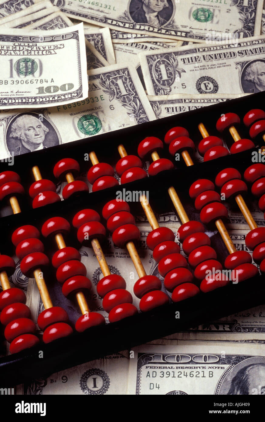 Abacus on American currency Stock Photo - Alamy