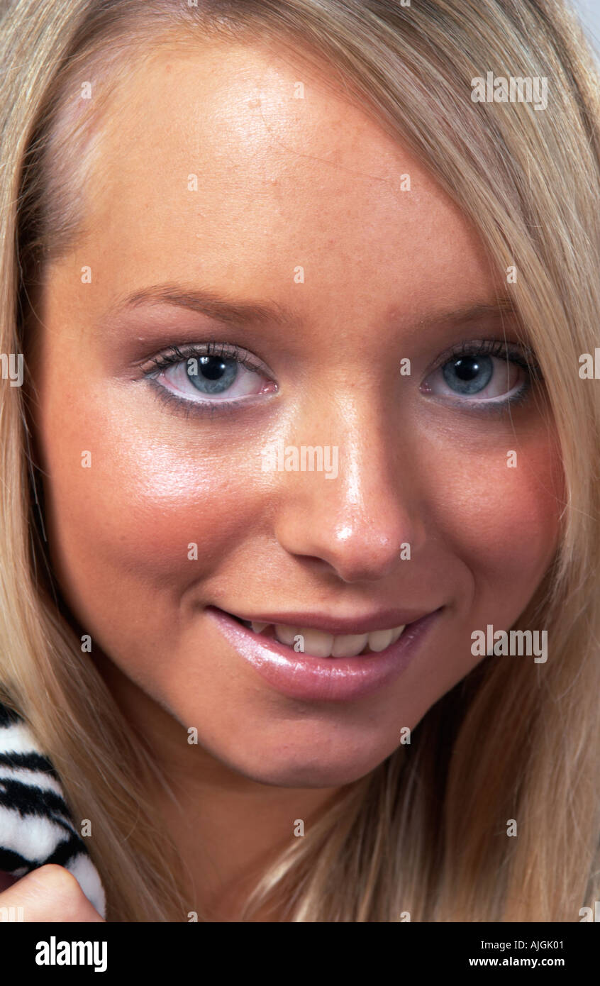 Portrait Of Teenage Girl Smiling Into Camera Stock Photo - Alamy