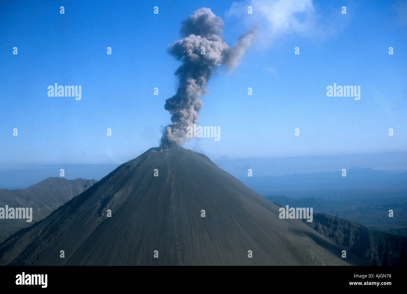 Karymsky Volcano erupts from the air Kamchatka Russia Stock Photo - Alamy