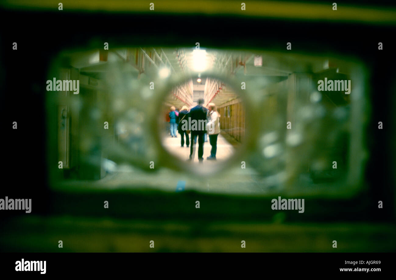 Women prison bars hi-res stock photography and images - Alamy