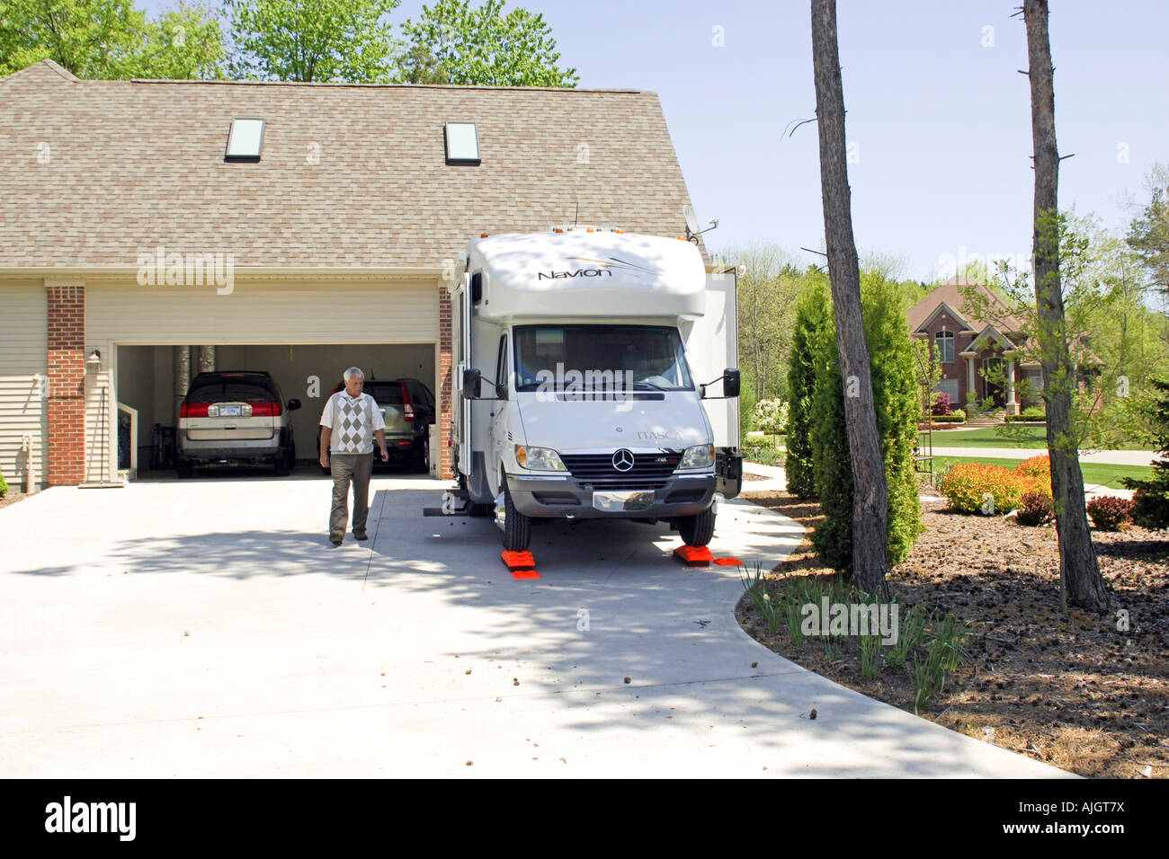 Motor home on levelling blocks whilst static on a sloping driveway ...