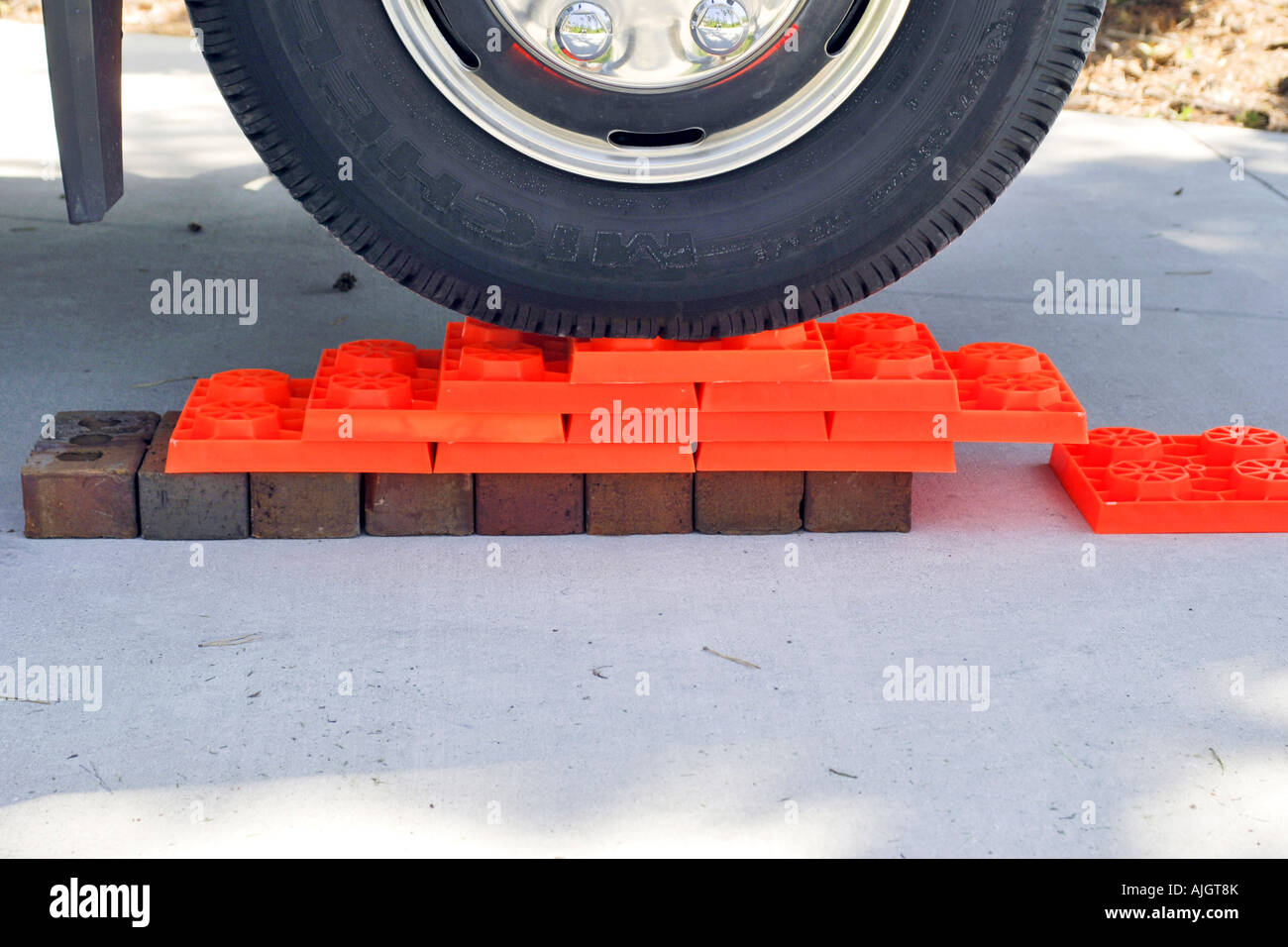 Motor home on levelling blocks whilst static on a sloping driveway ...