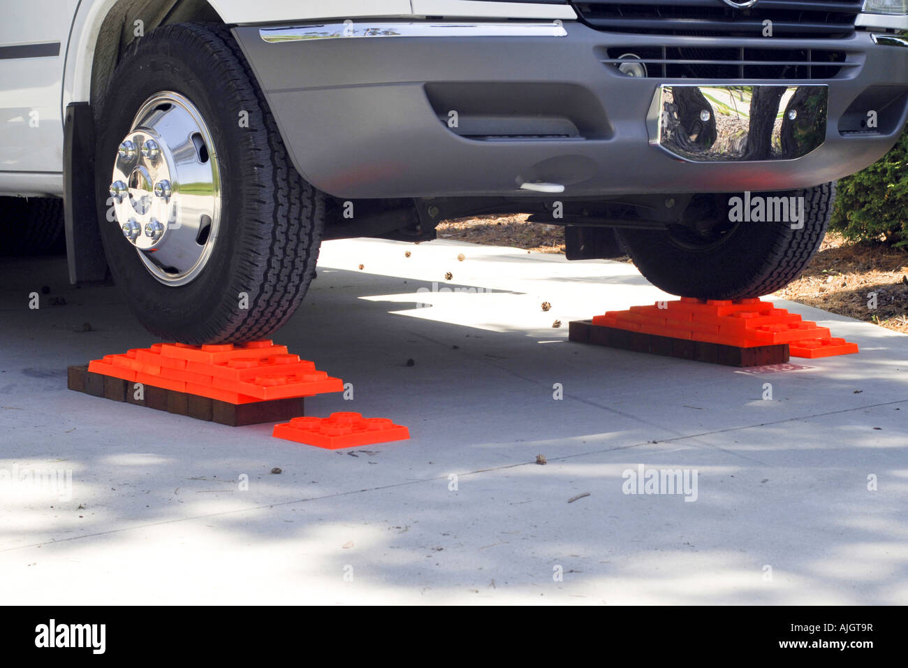 Motor home on levelling blocks whilst static on a sloping driveway ...