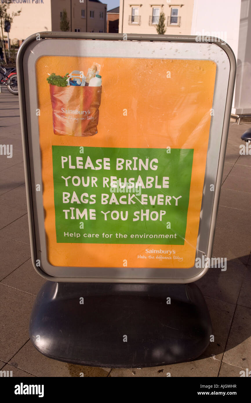Poster encouraging reusable bags outside Sainsbury Cheltenham UK Stock ...