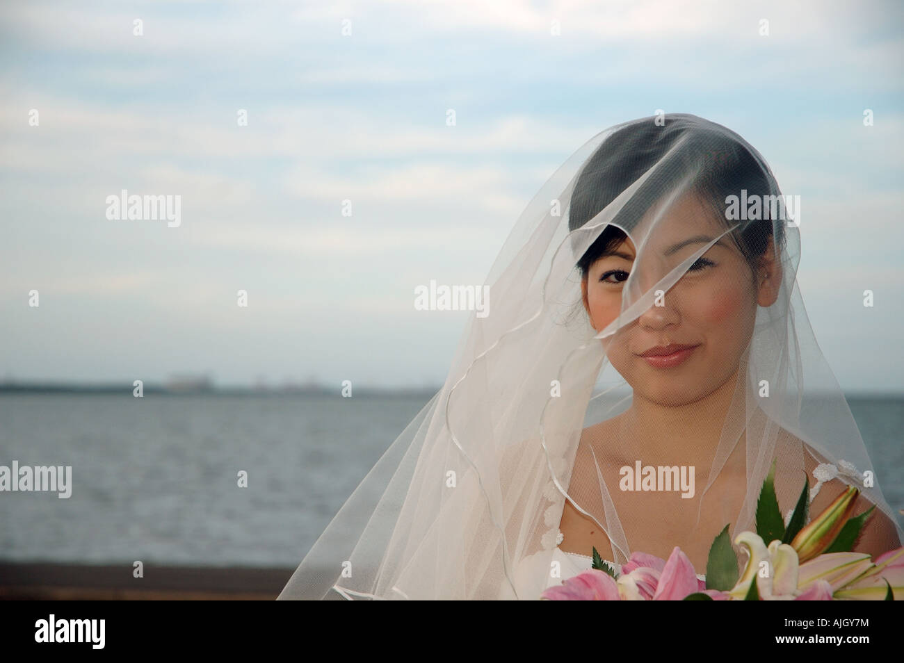 Asian bride western gown Stock Photo - Alamy