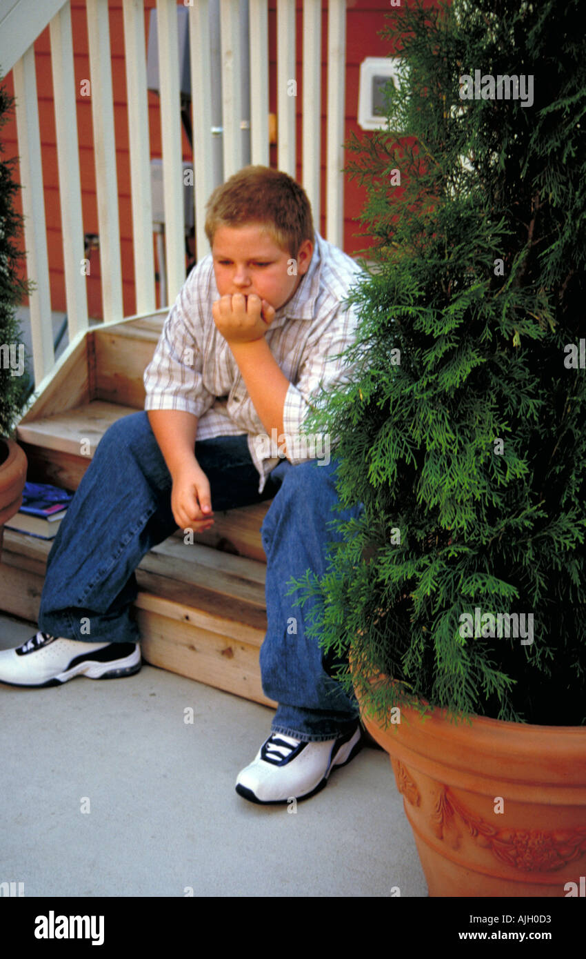 Bored teen boy hi-res stock photography and images - Alamy