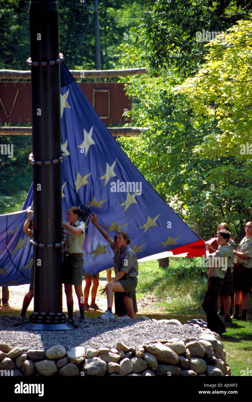 Flag raising at scout camp Stock Photo - Alamy