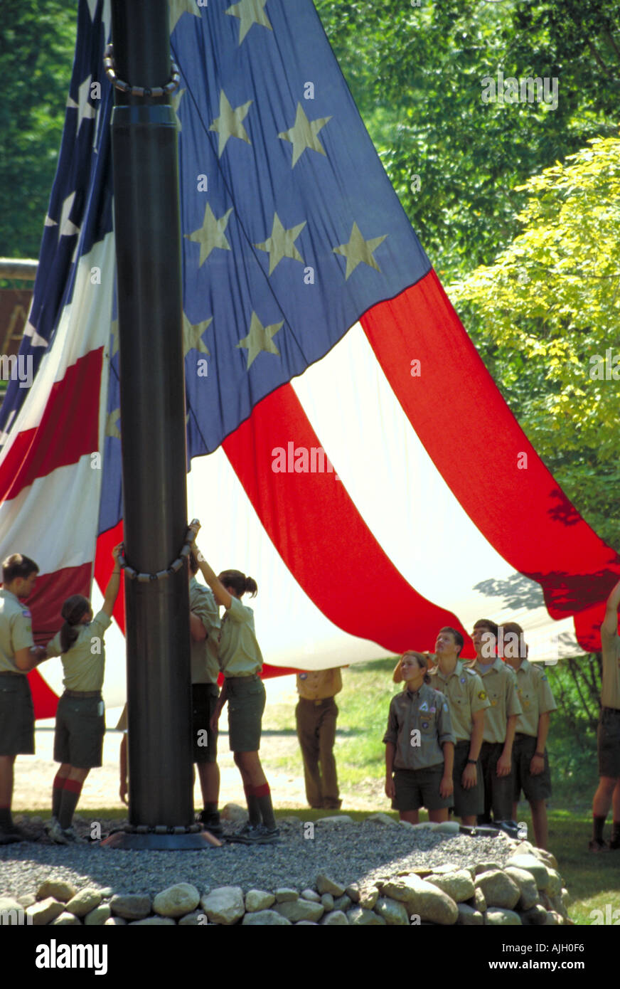 Flag raising at scout camp Stock Photo - Alamy