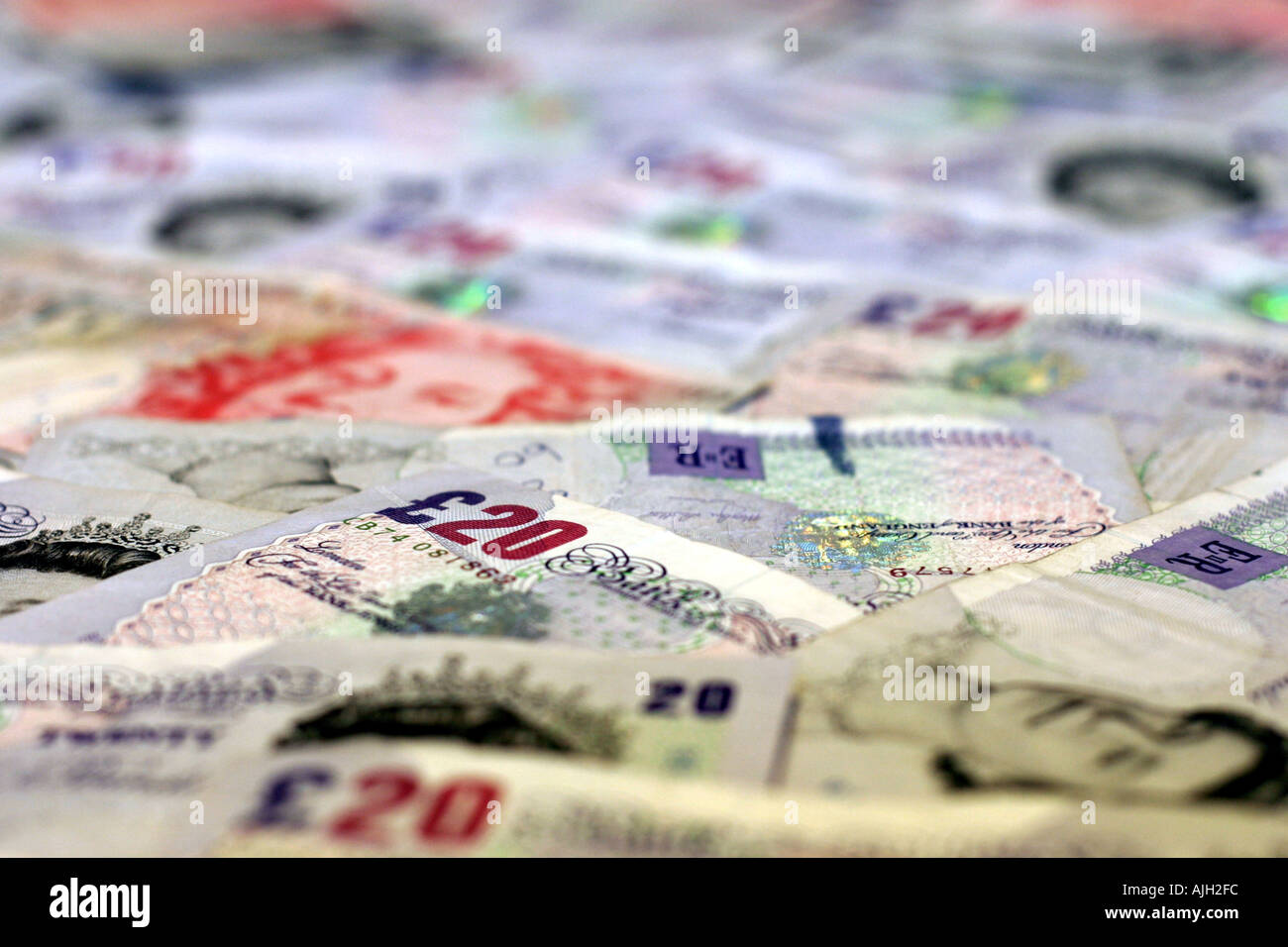 twenty and fifty pound notes covering a surface Stock Photo - Alamy