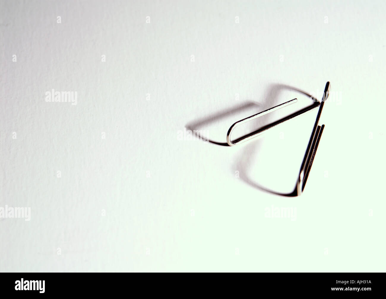 bent paper clip Stock Photo - Alamy